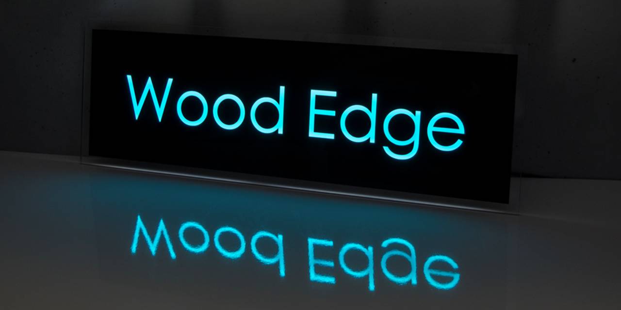 The Sirius range of modern acrylic house plaques by Plastic Republic.